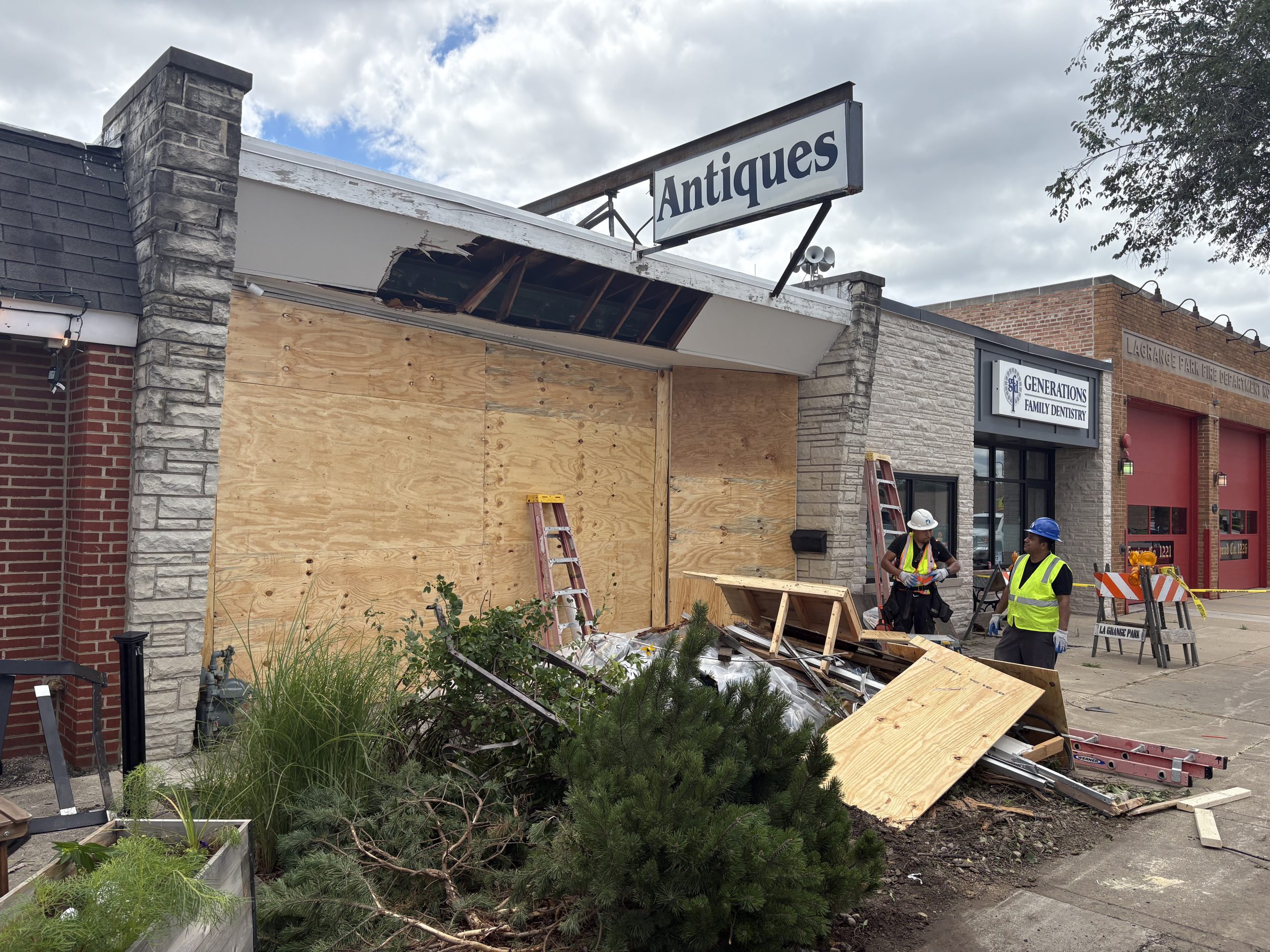 Garbage truck crashes into antique storefront - Riverside-Brookfield ...